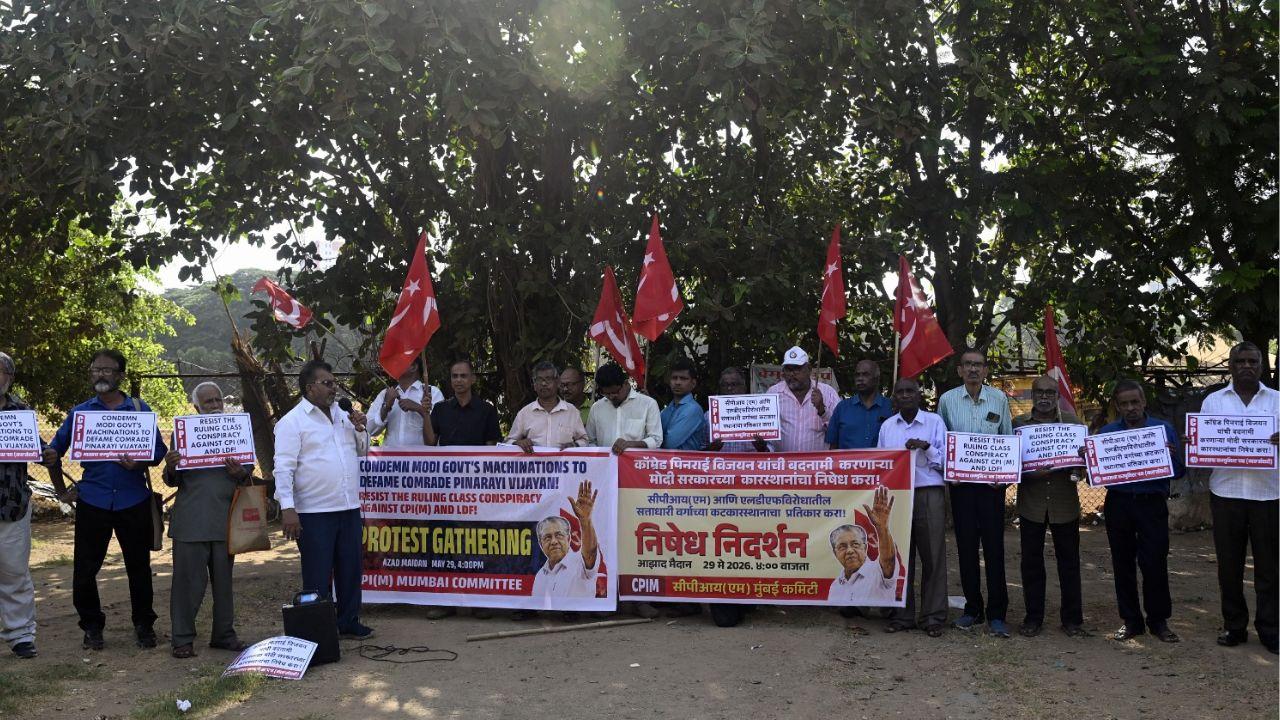 IN PHOTOS CPM activists stage protest at Azad Maidan over raid at ...
