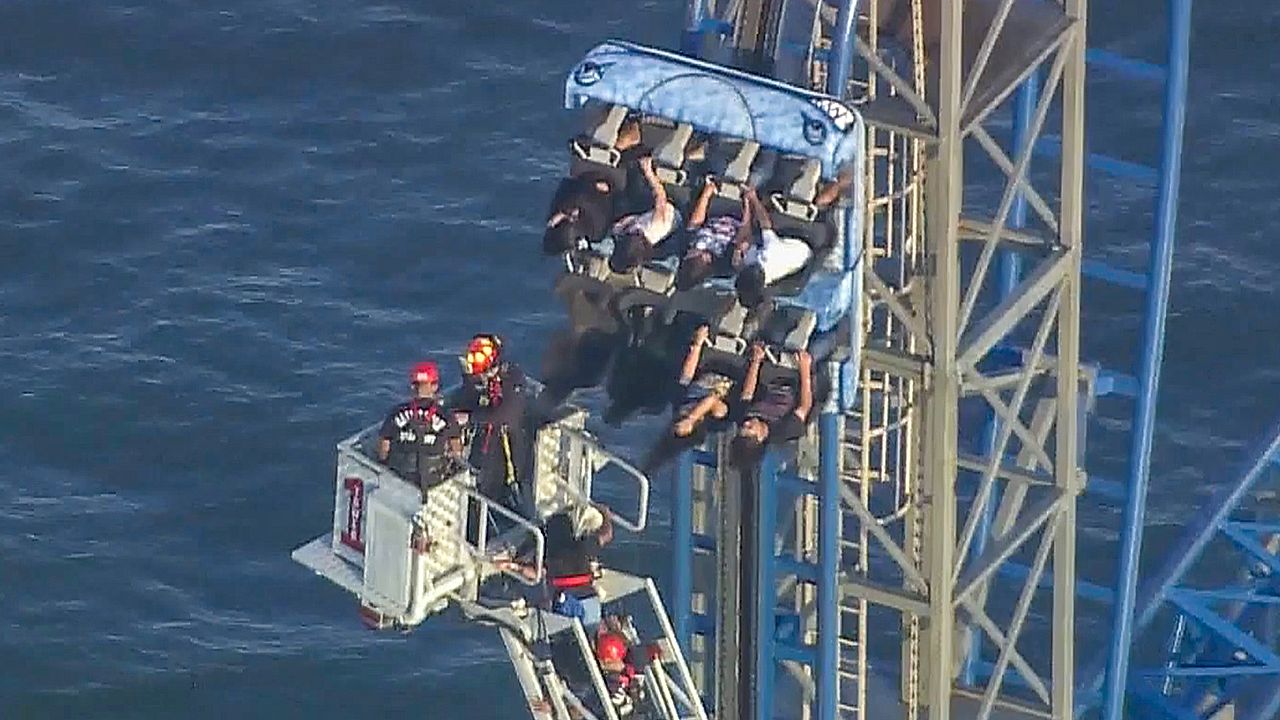 Eight students rescued after roller coaster got stuck 100 feet up in Texas