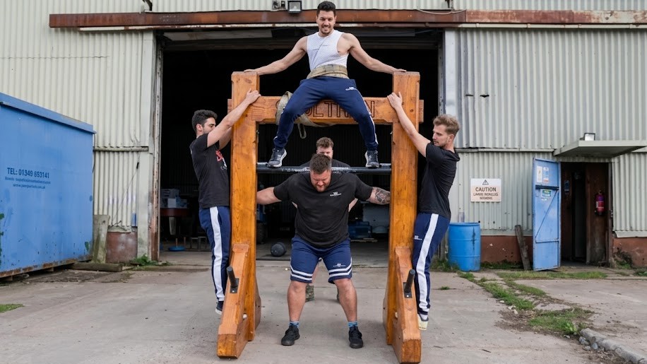 He eats 10,000 calories a day - then lifts a 630-pound stone