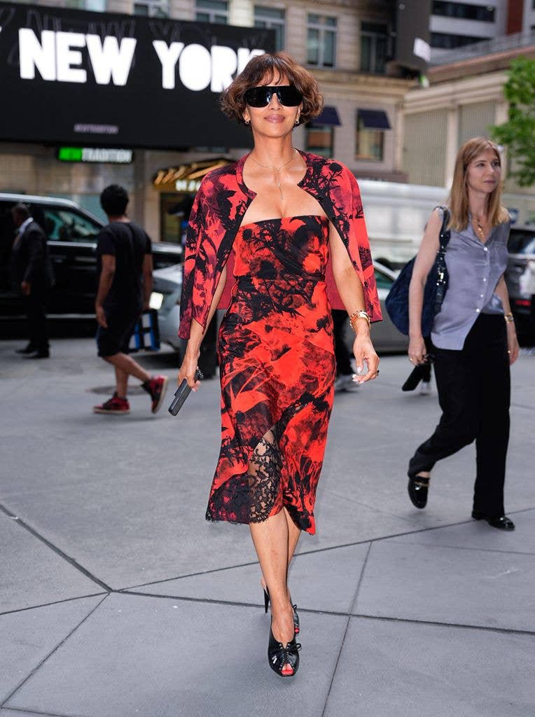 Halle Berry is the ultimate lady in red in semi-sheer dress