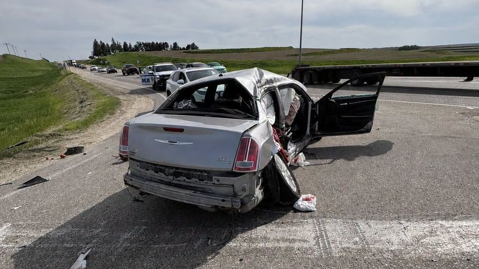 Three vehicles, including semi, collide sending one woman to the hospital