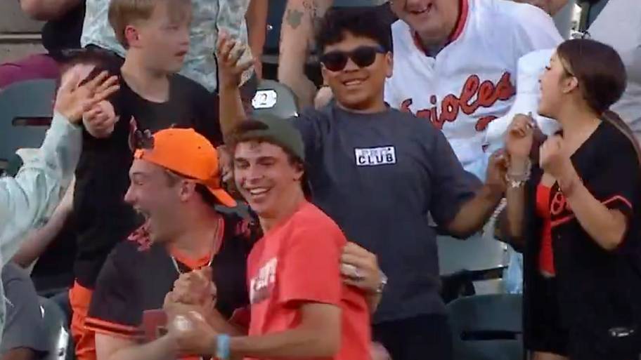 Orioles fan lives the dream by catching two balls in the same game