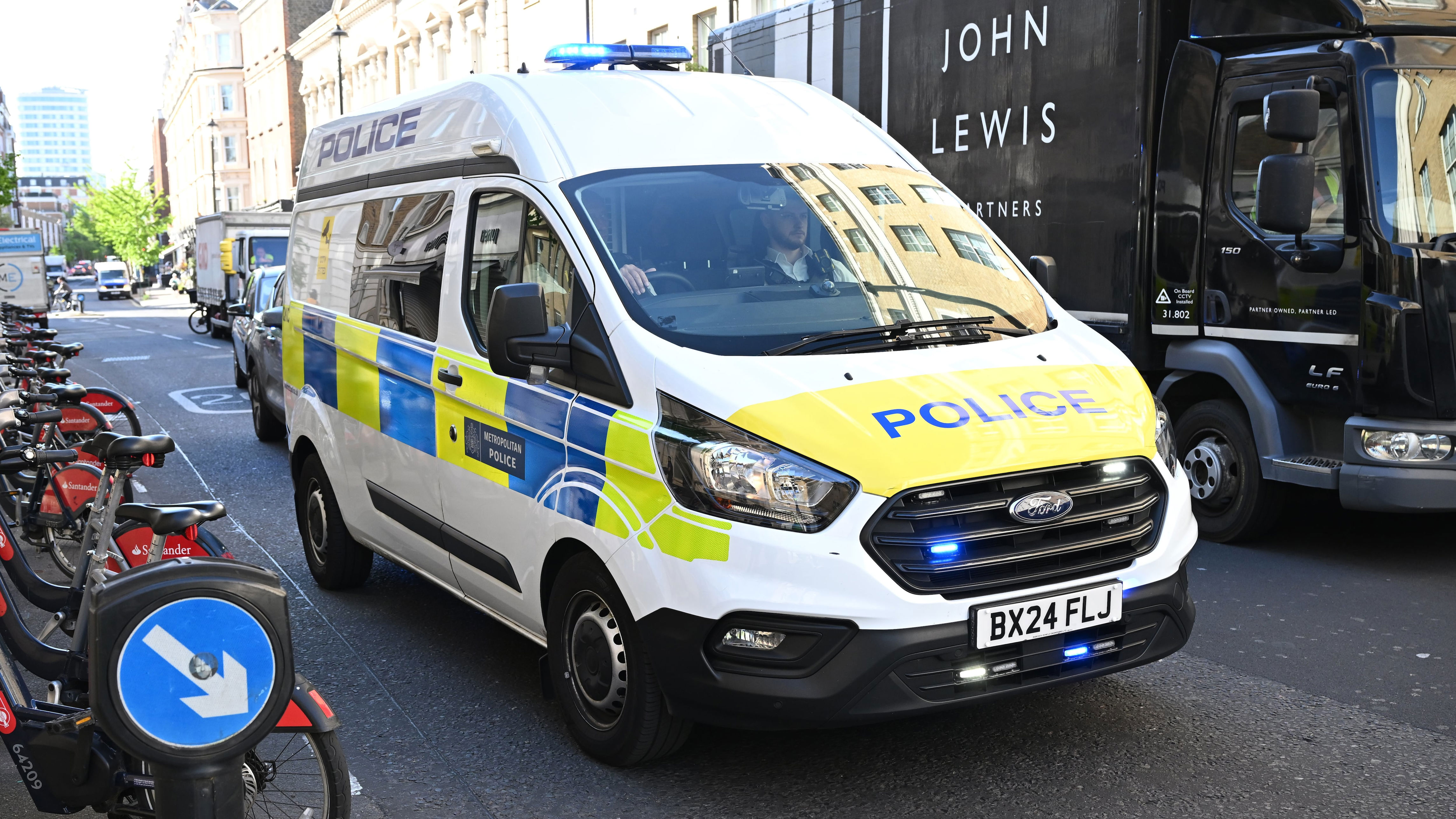 Man escapes prison van and gets run over by train