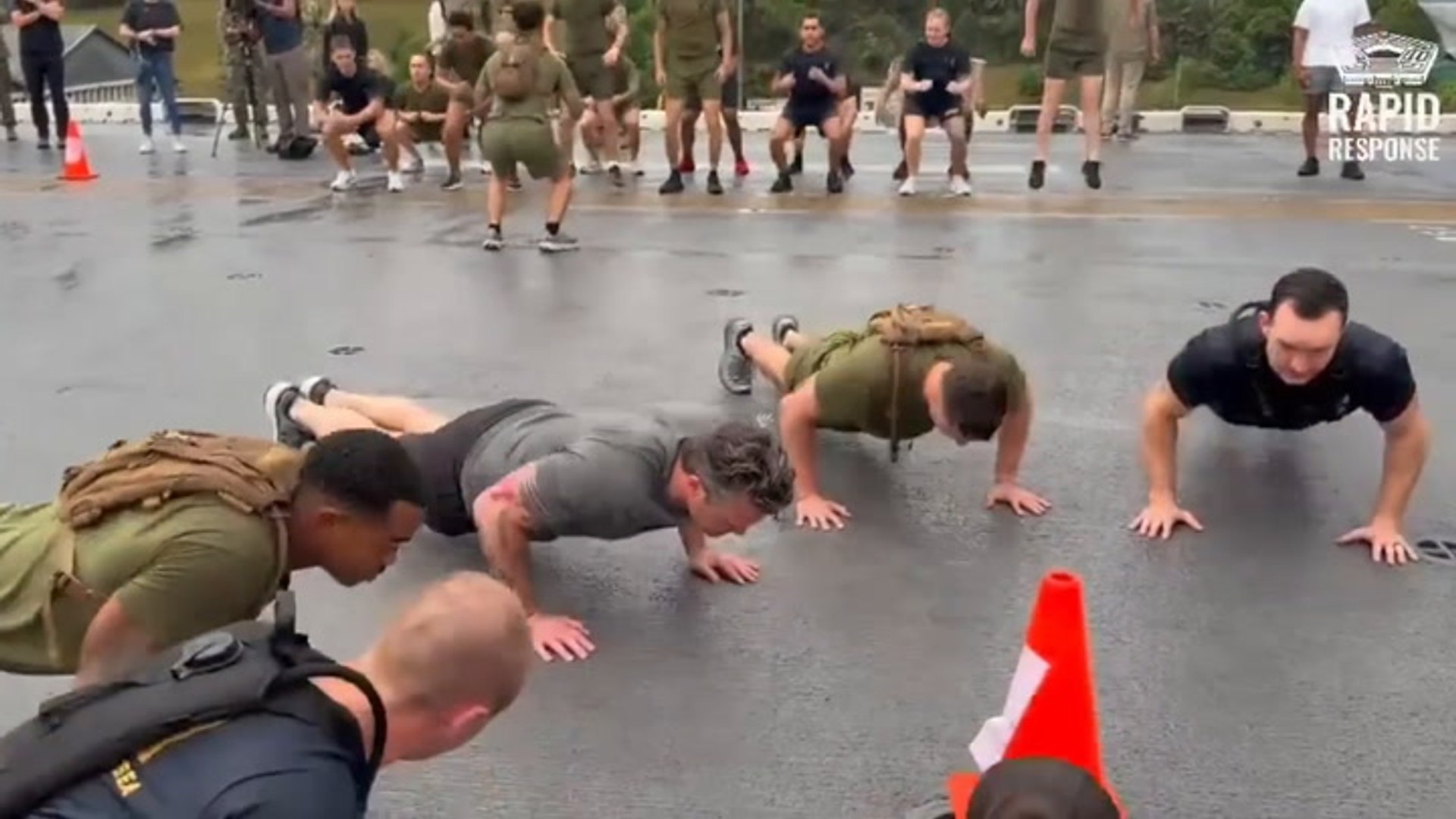 Pete Hegseth does push ups with military personnel at Singapore dock