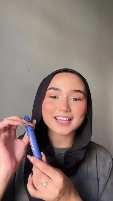 I swapped black lashes for bright blue mascara