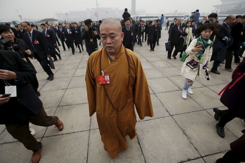 Former Shaolin Temple's head sentenced to 24 years, state media reports