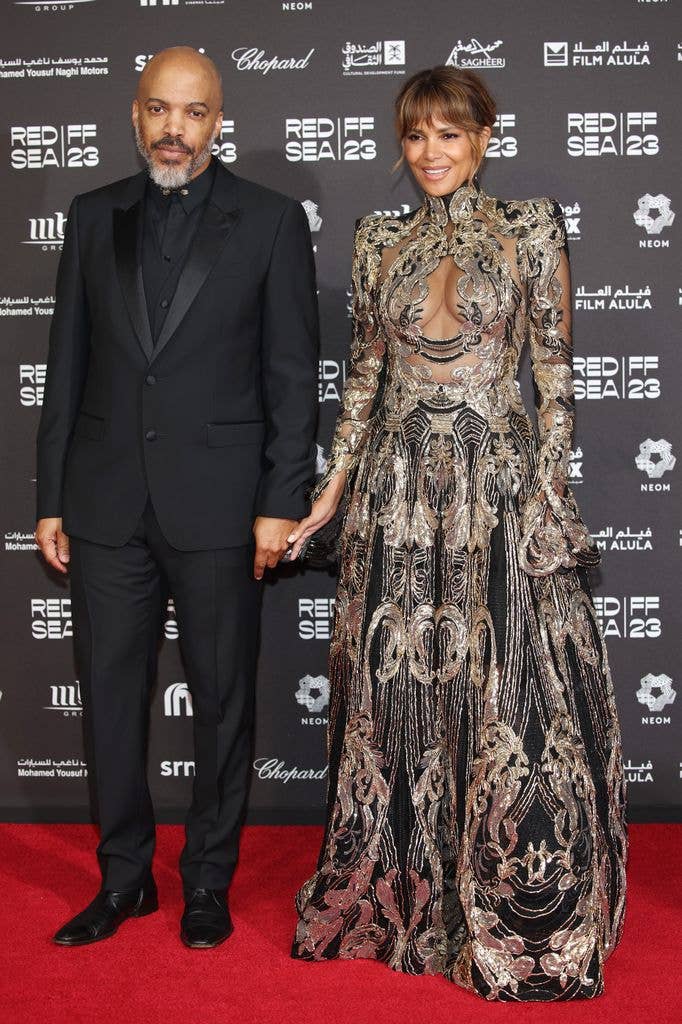 Halle Berry is the ultimate lady in red in semi-sheer dress
