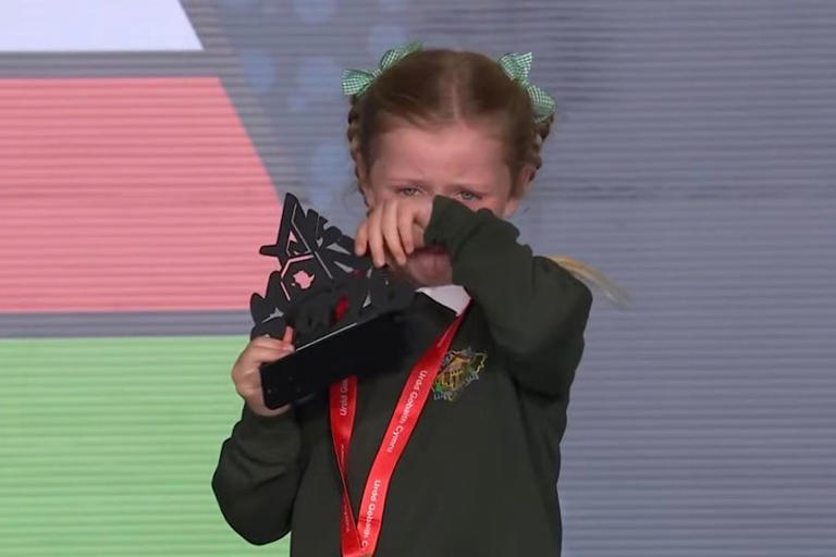 Little girl in tears in beautiful moment that has captured Welsh hearts