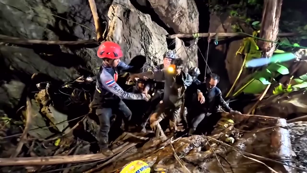Rescuers pull out first trapped person from flooded Laos cave