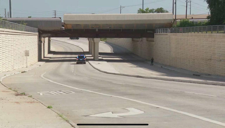 Nearly a dozen train cars seen dangling from Houston overpass after ...