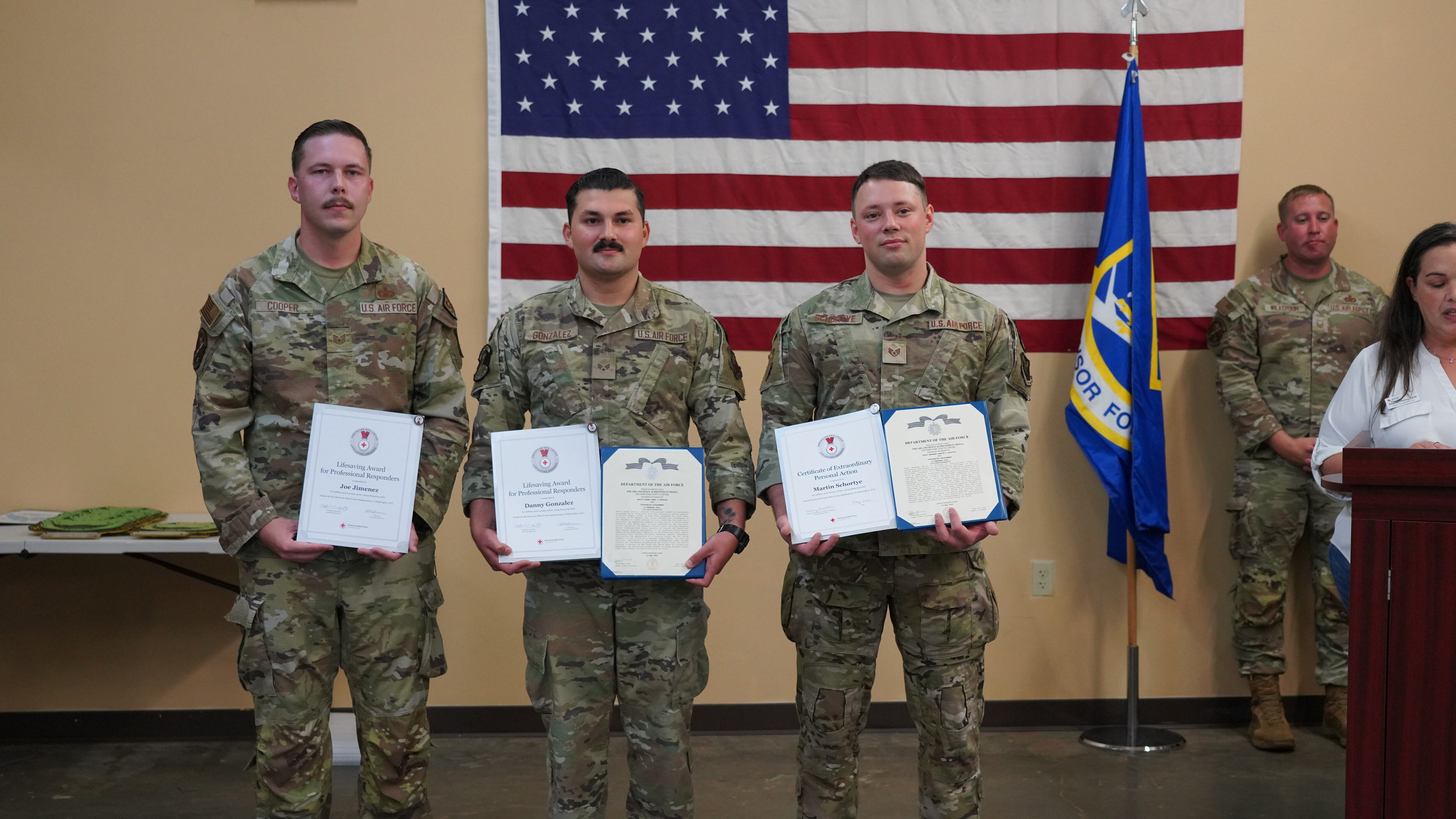 3 airmen honored by Red Cross for saving man’s life after wreck in ...