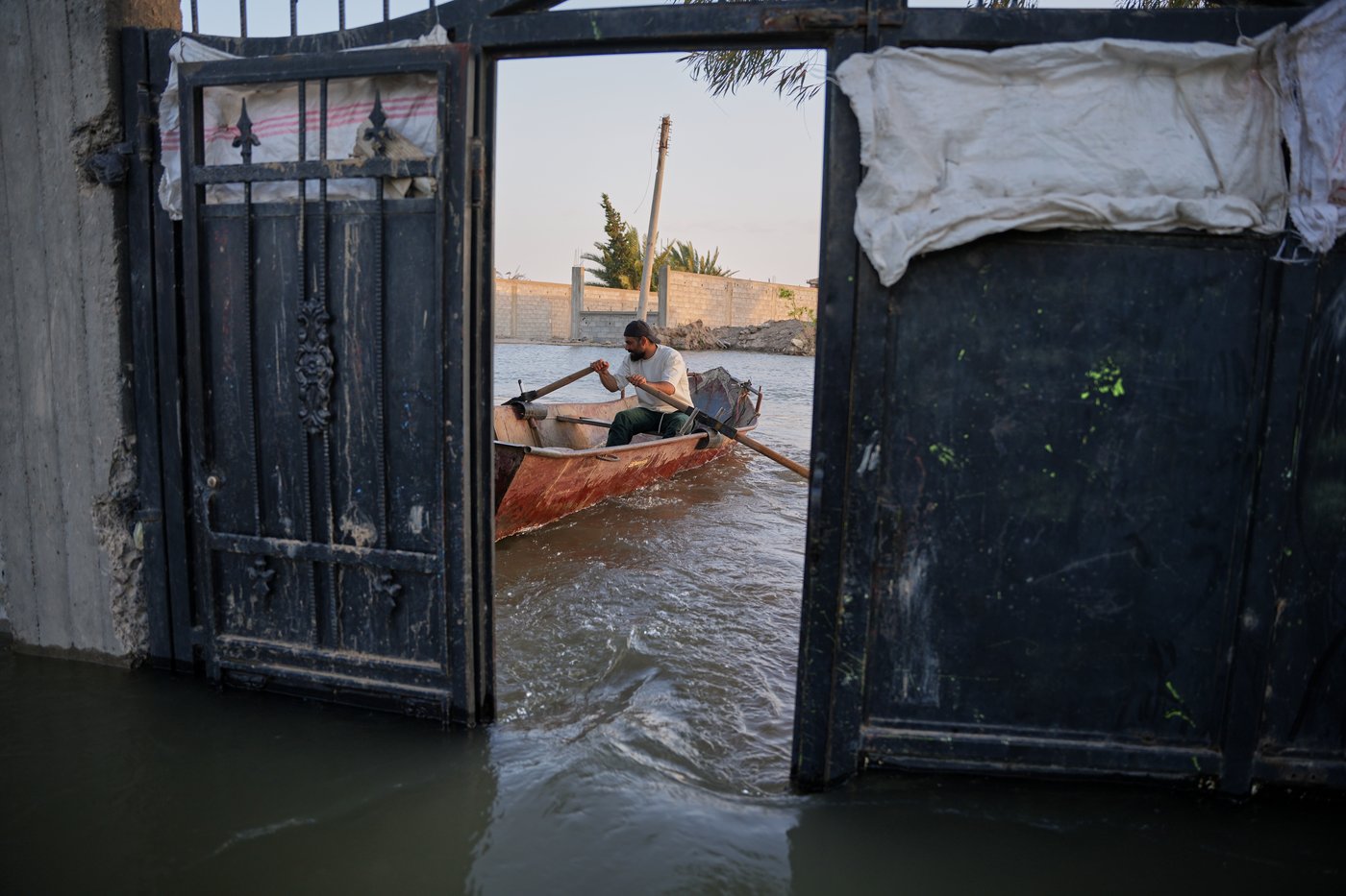 Photos of rare Euphrates River flooding forcing Syrians inland