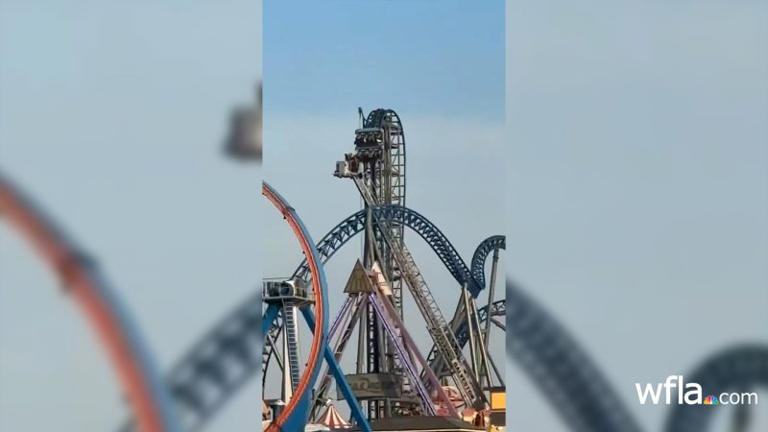 Watch: Thrillseekers stuck mid-air on roller coaster for hours