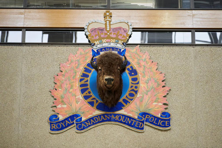 Man found dead near Manitoba self-storage compound, man charged