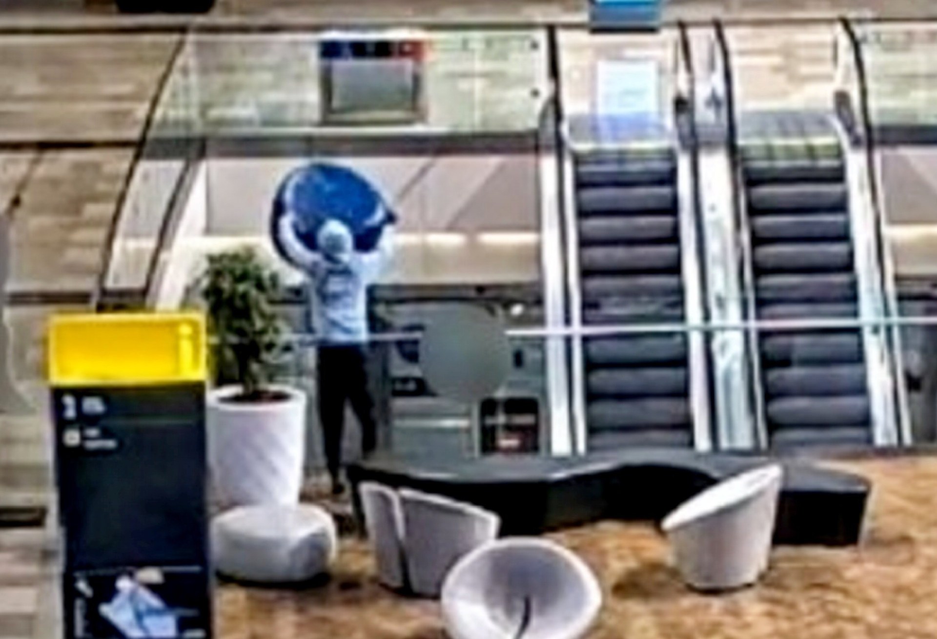 New footage shows sofa narrowly missing shoppers after teen threw it ...
