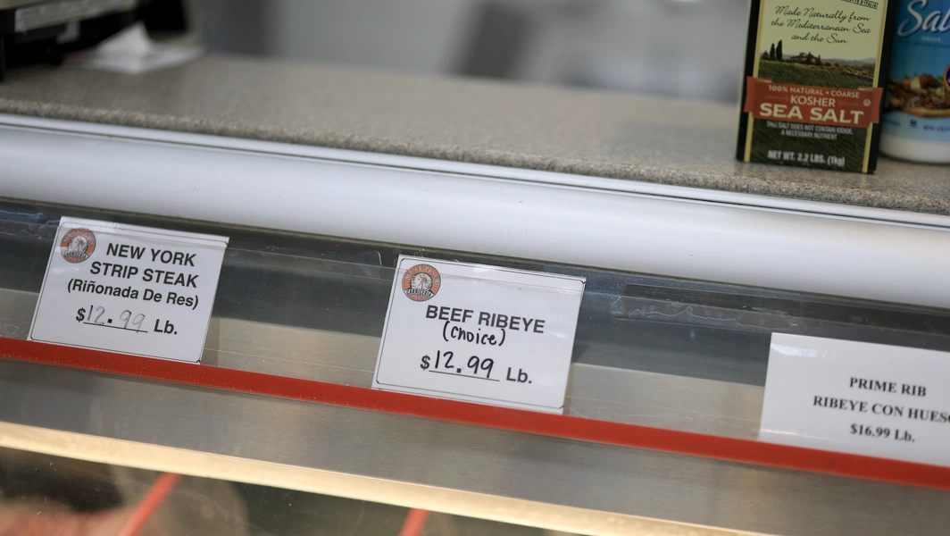 Burger price surge fuels political clash over grocery costs