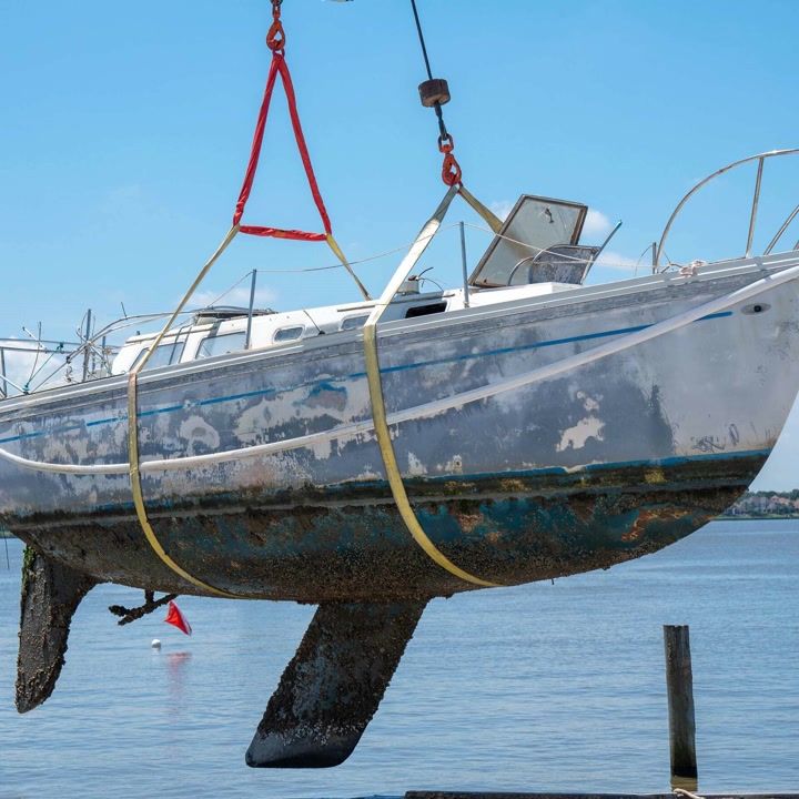 Clear Lake's 'dead boats' finally getting hauled out of the water