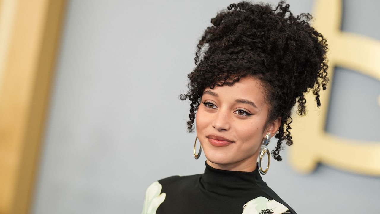 Chase Infiniti's half-twisted updo is the perfect summer protective style