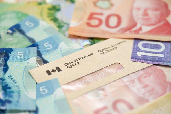 An $8.7M CRA settlement was approved and some Canadians can claim over $5K