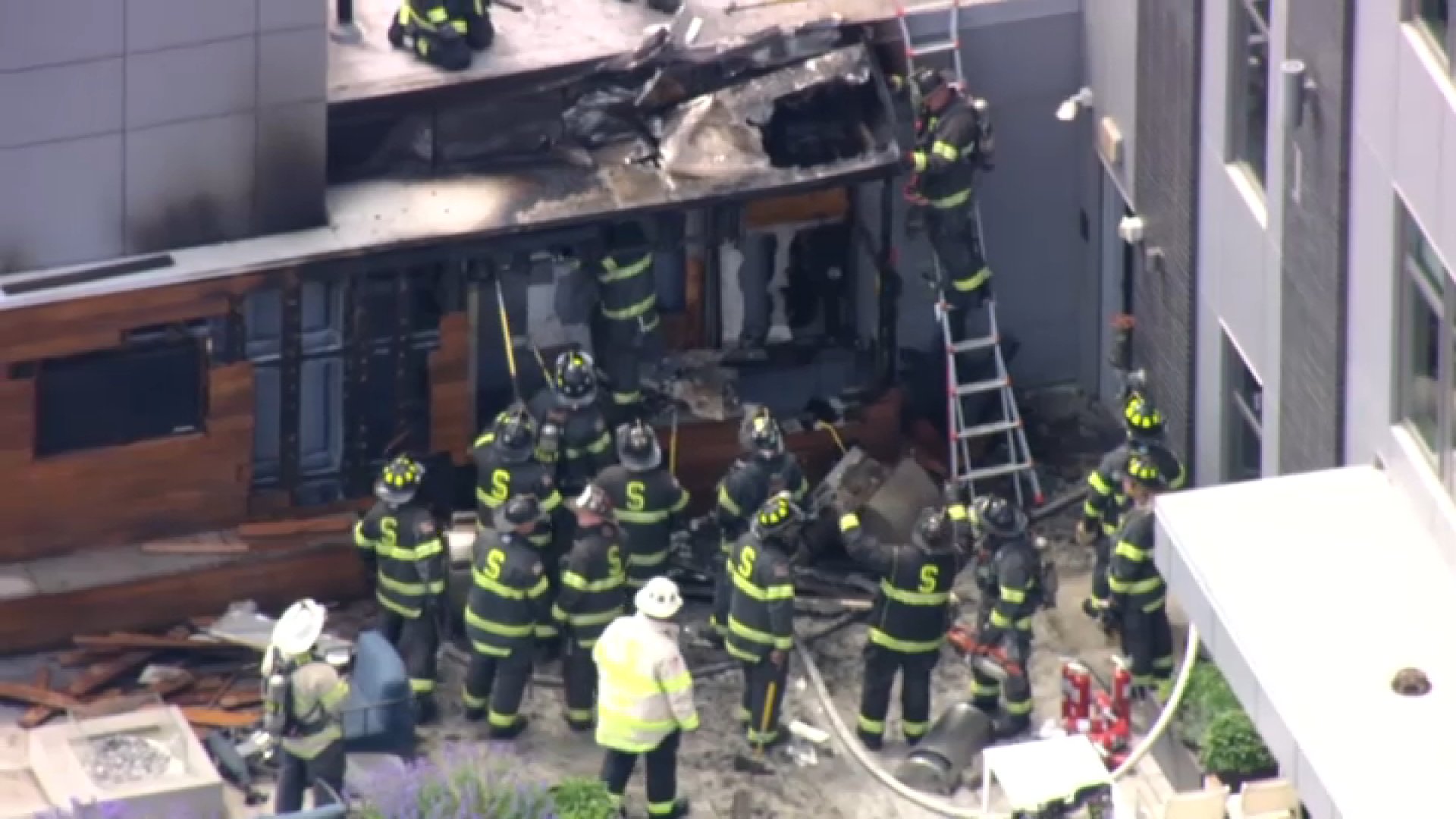 Fire reported on roof of Assembly Row condo building, nearby hotel ...