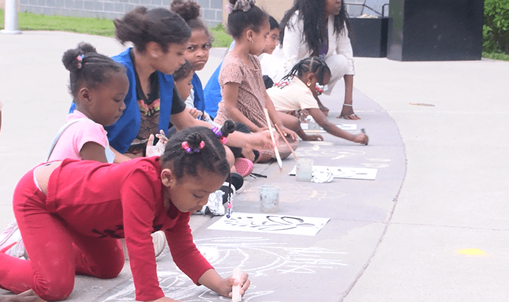 RCSD students brighten rainy days with invisible sidewalk art