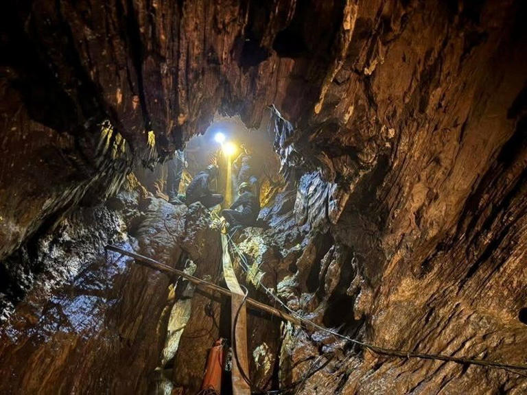 Rescuers pull first trapped person from flooded Laos cave