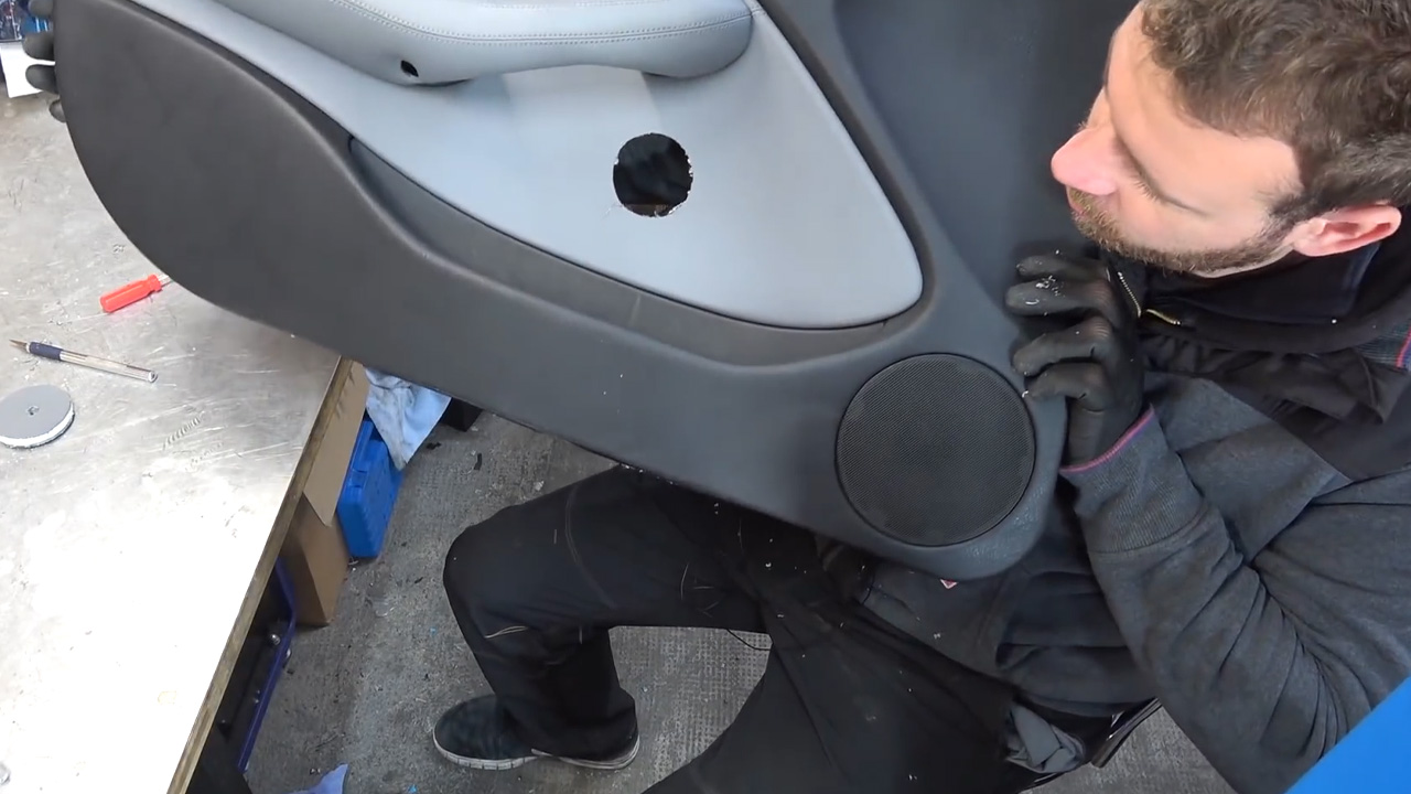 Cutting expensive leather door panels for unexpected speaker upgrades