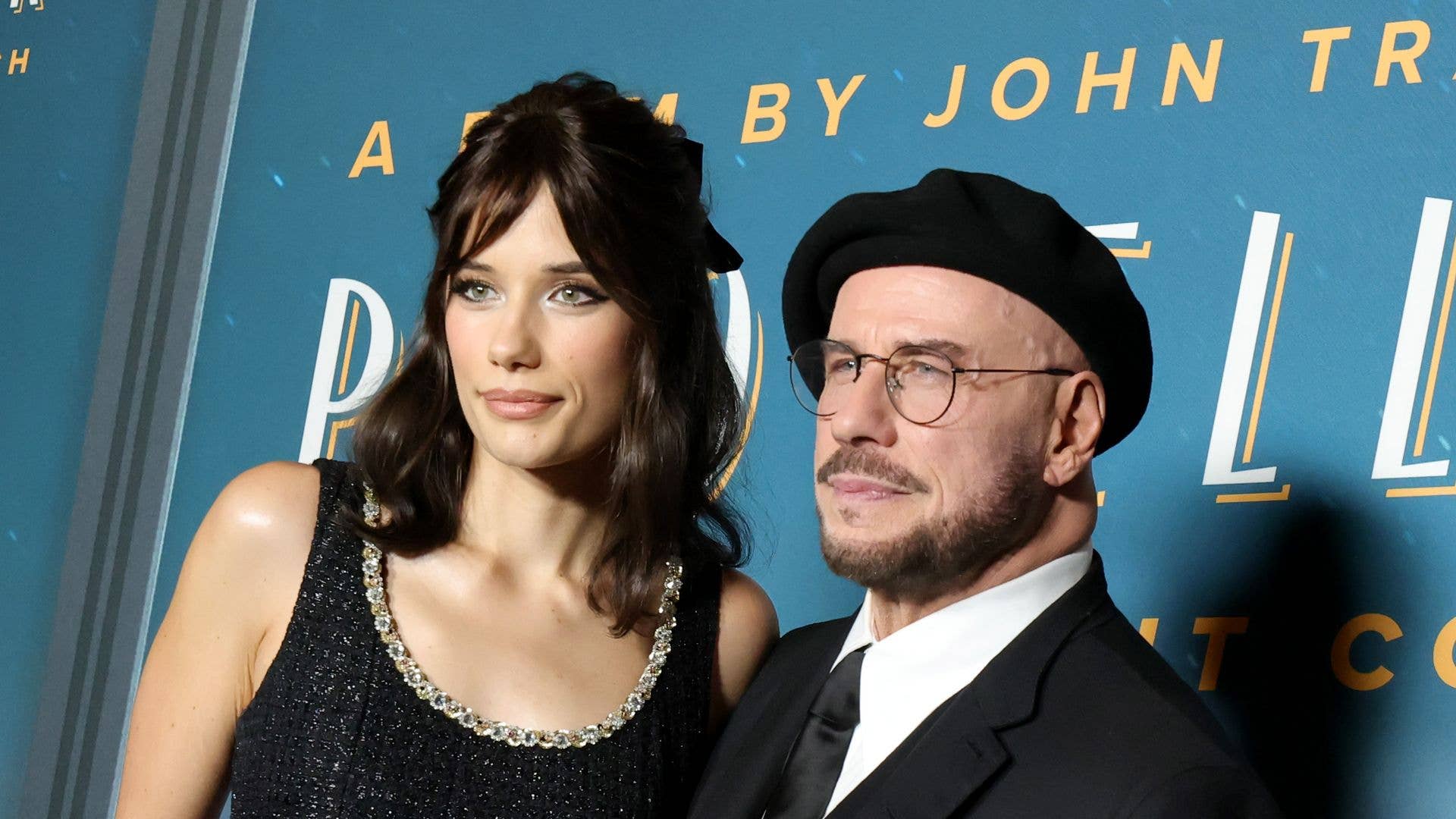 John Travolta's daughter Ella Bleu towers over him in latest red carpet ...
