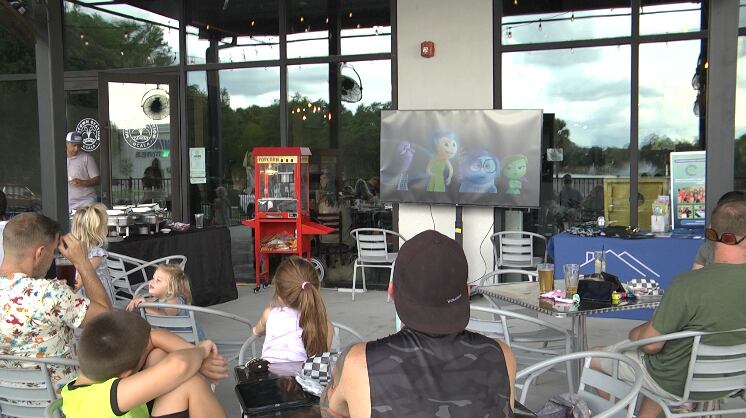 Rain can’t stop family movie night at Midtown Station in Ocala