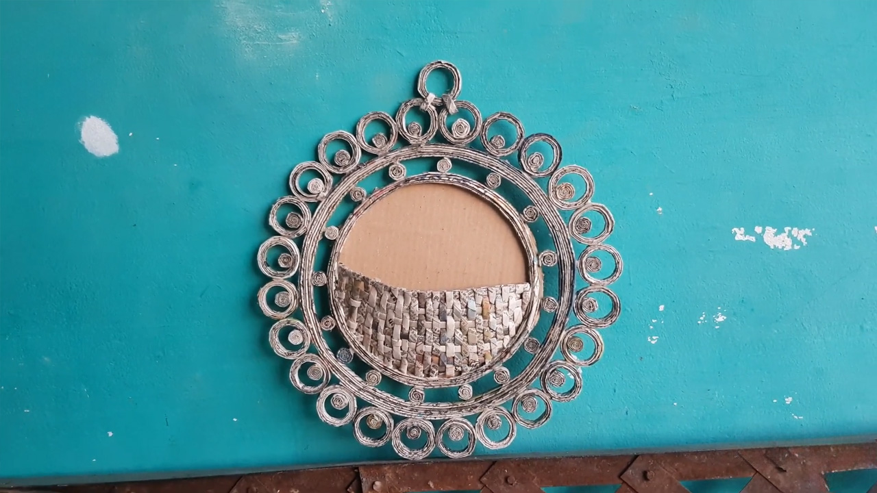 DIY newspaper wall hanging toran with flower vase design