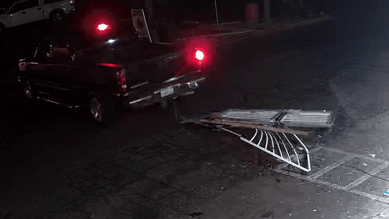 Video: Truck used to rip off security door in $5,000 Meta Liquor burglary