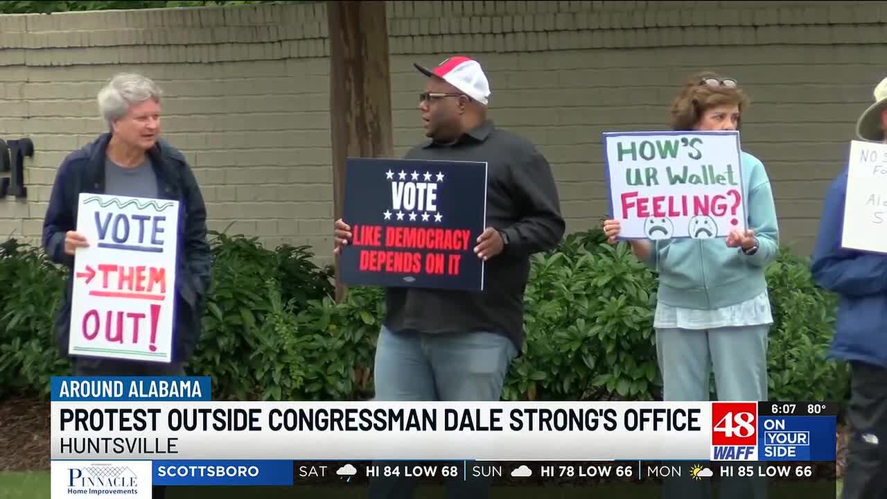 Protesters rally outside Rep. Dale Strong’s Huntsville office, urge ...