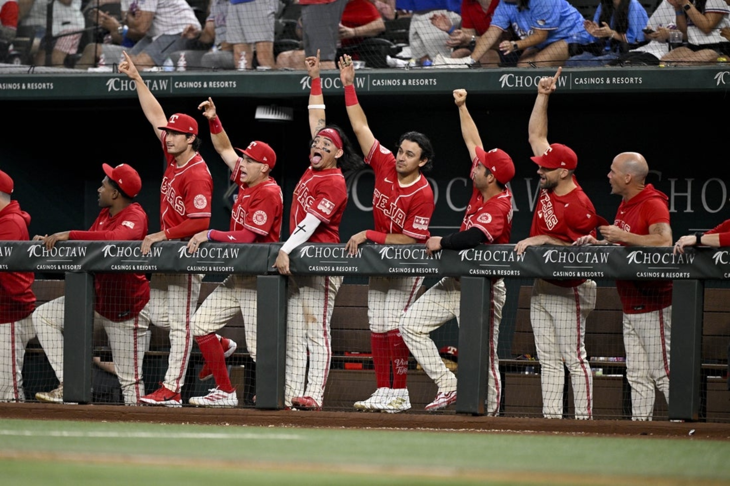 Resurgent Rangers rout struggling Royals