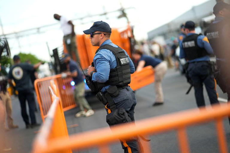 New Jersey state police assert control outside migrant detention center