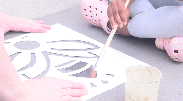 RCSD students brighten rainy days with invisible sidewalk art