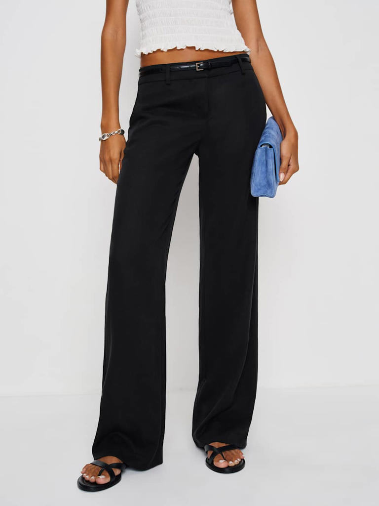 Spotted in NYC: The chicest way to wear black trousers and a ...