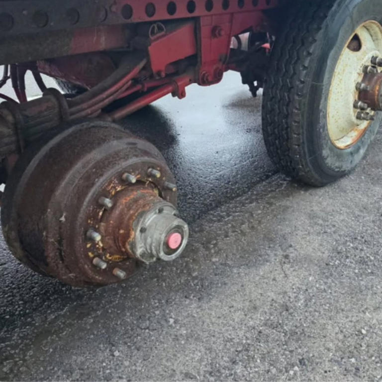 Ottawa police stop truck hauling trailer missing most of its wheels