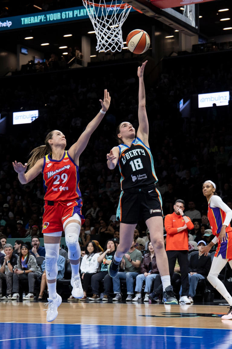 Rookie Pauline Astier leads way as Liberty win tight battle with Mercury