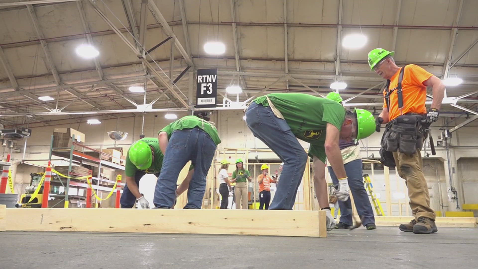 John Deere volunteers partner with Habitat for Humanity to build ...