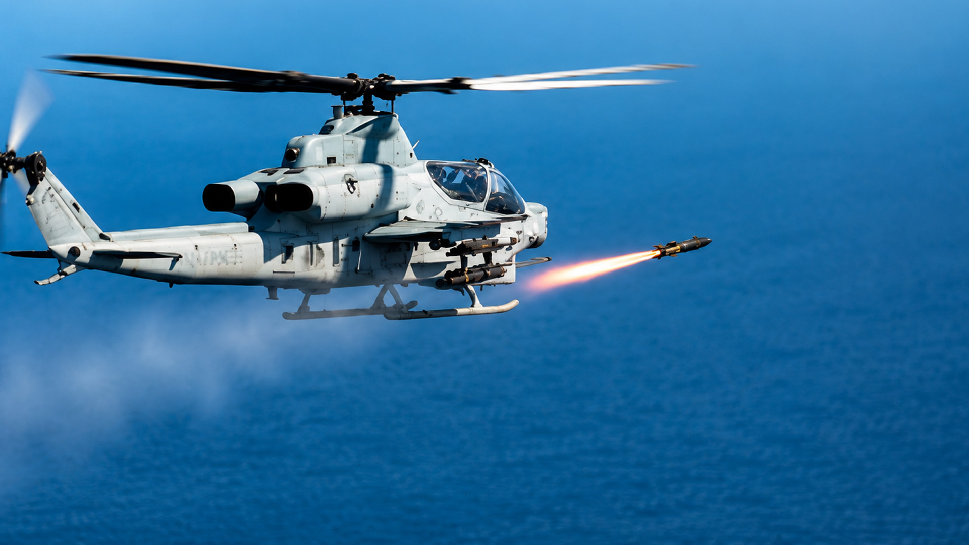Watch marine helicopters shoot during live fire exercise