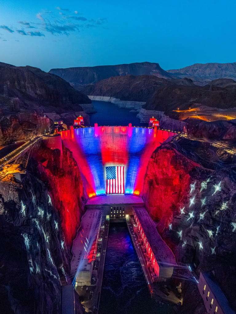 Gargantuan American flag unfurled at iconic Western landmark to ...