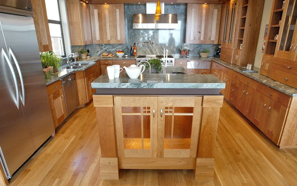 Designers favor contrasting wood tones over matching finishes