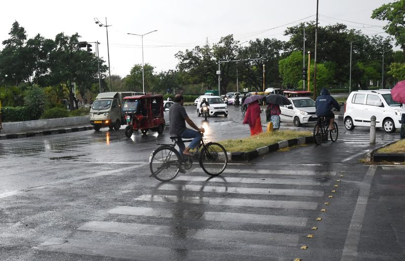 Finally! Rain, dark clouds, cool breeze break heatwave grip on ...