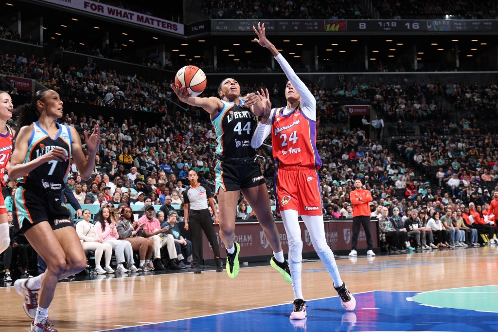 Rookie Pauline Astier leads way as Liberty win tight battle with Mercury