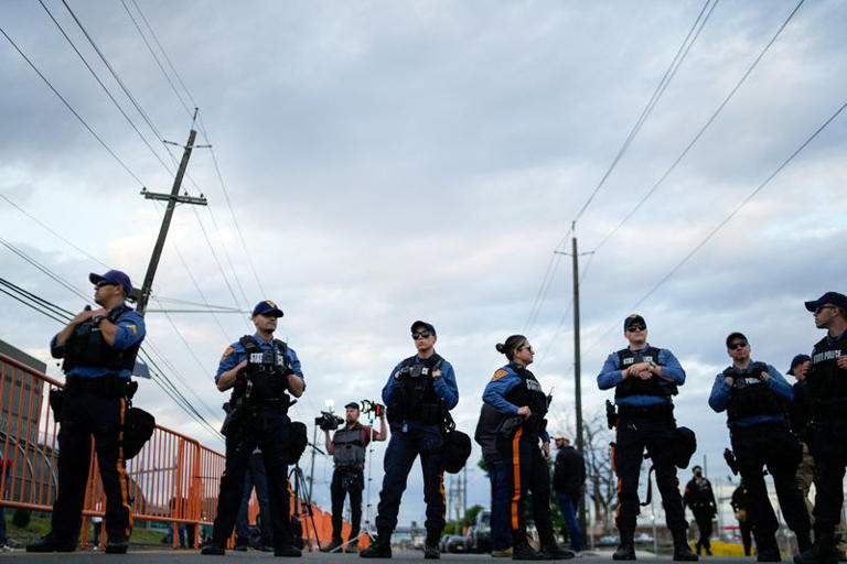 New Jersey state police assert control outside migrant detention center