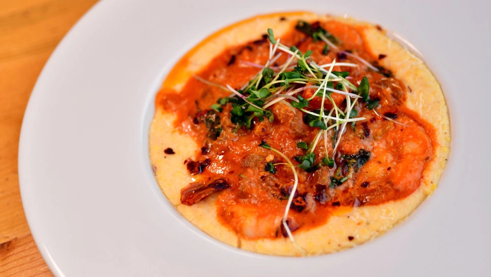 Southern comfort on a plate with grits and waffles