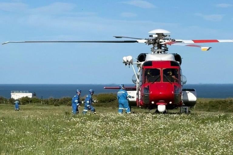 Person stranded on Flamborough Head cliff after climbing down to ...