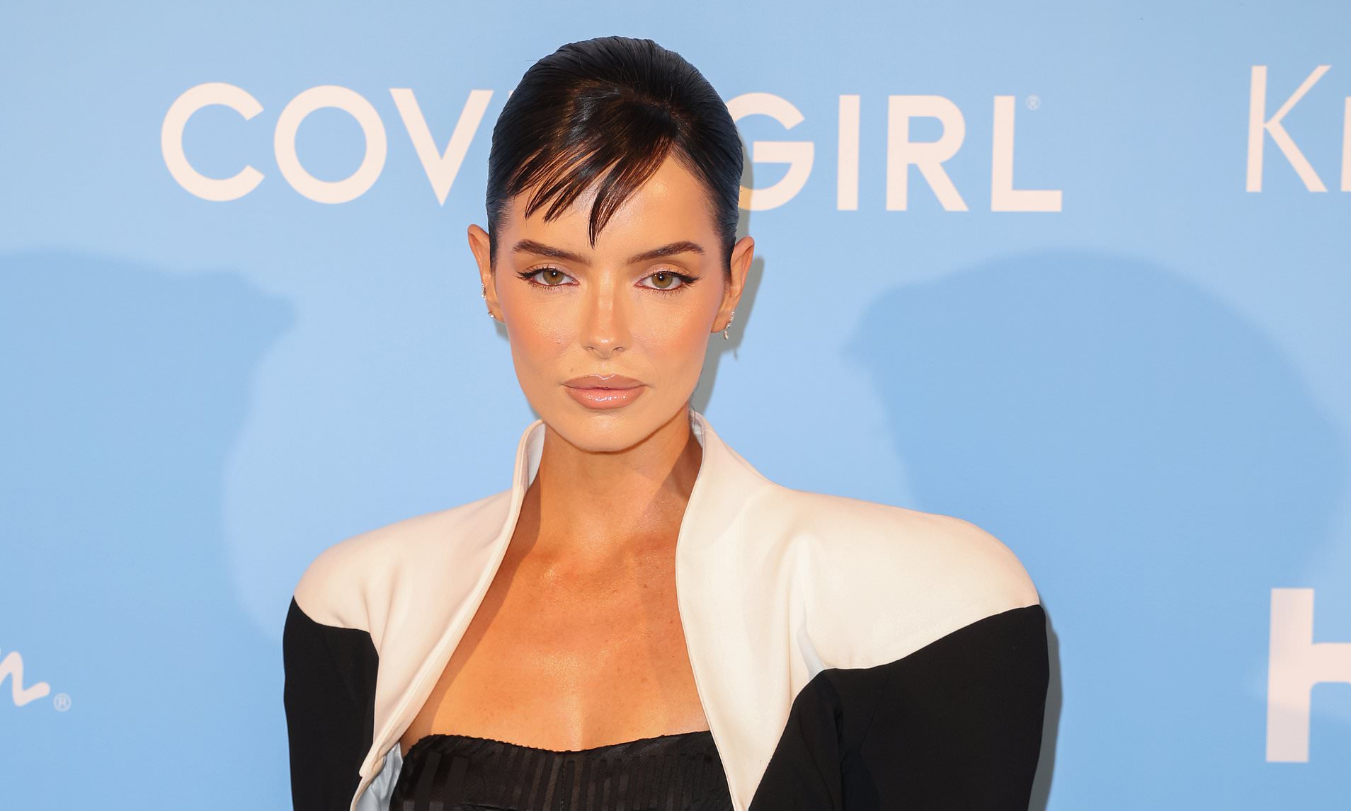 Maura Higgins showcases her toned abs in tiny black bralette and figure ...