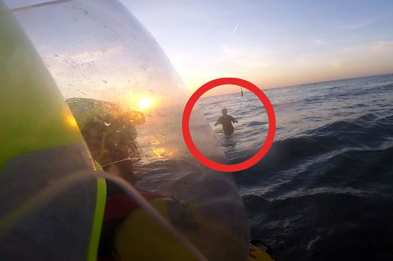 Woman trapped in sinking sand on North Wales beach rescued as tide ...