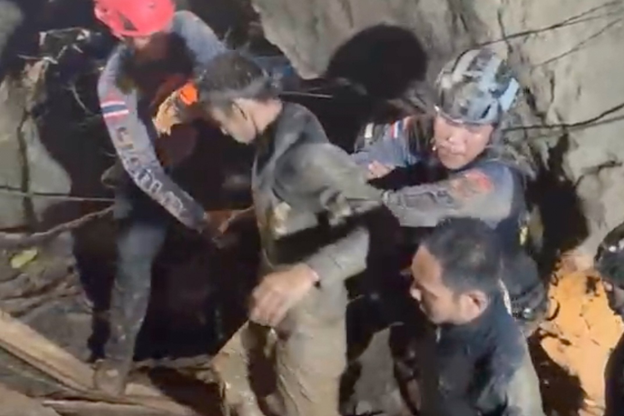Four people rescued from flooded cave after 10 days